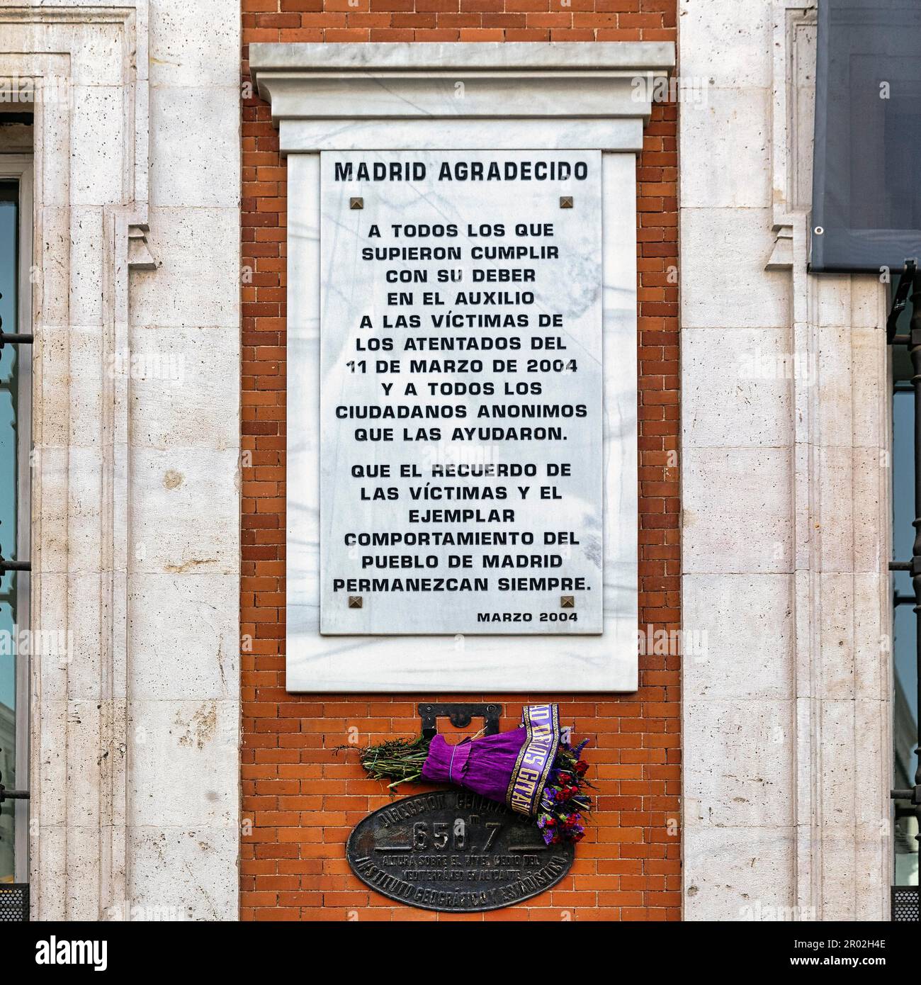 Facade detail with memorial plaque for the victims of the 2004 ...