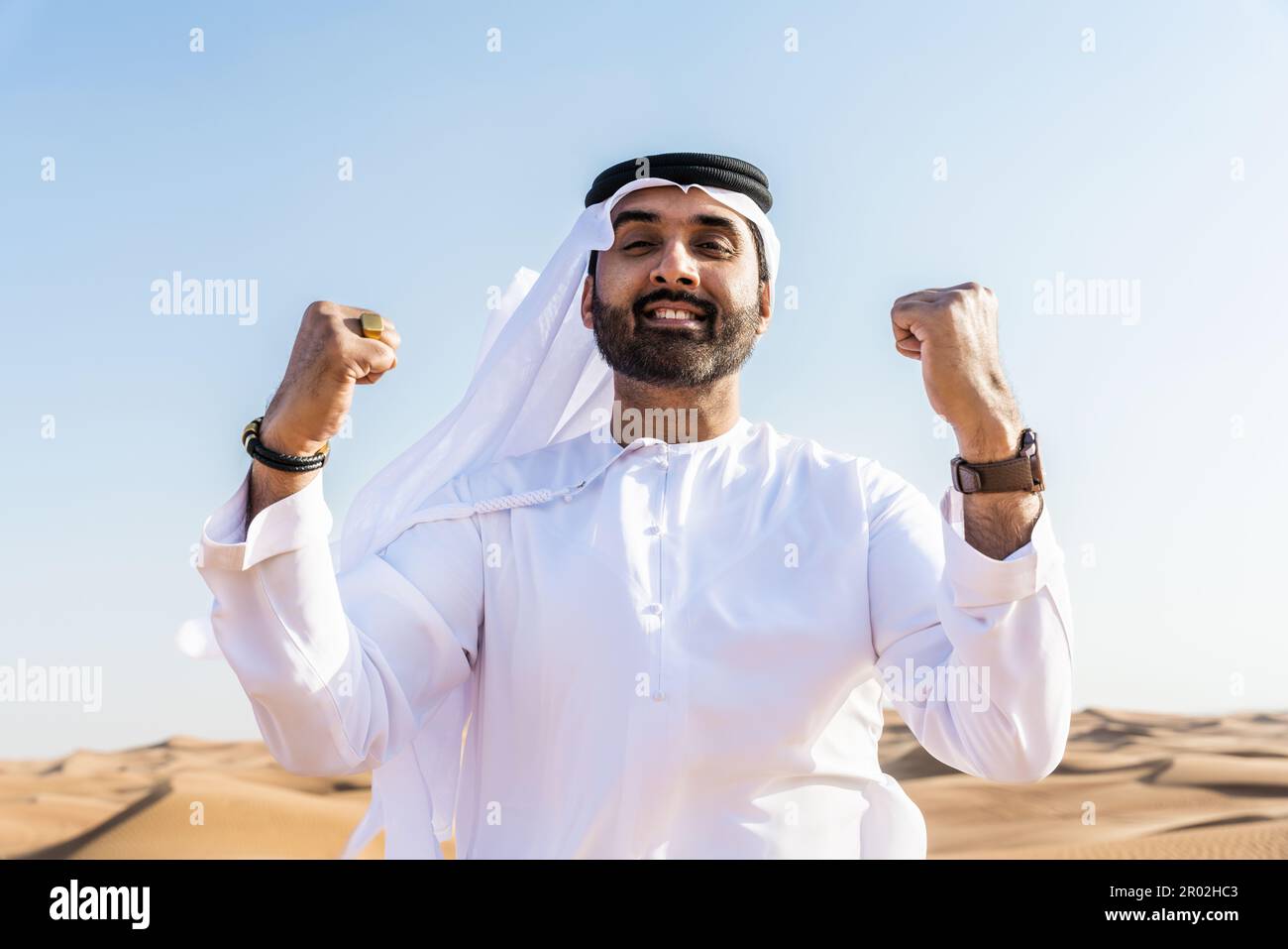 Handsome and successful middle-eastern man wearing traditional emirati ...
