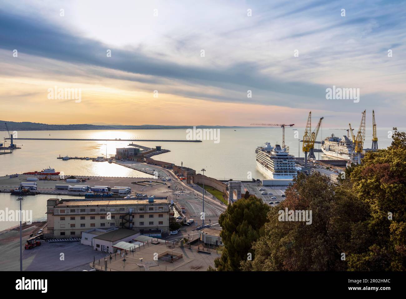 The Fincantieri shipyard in the industrial harbour at dusk, Ancona ...
