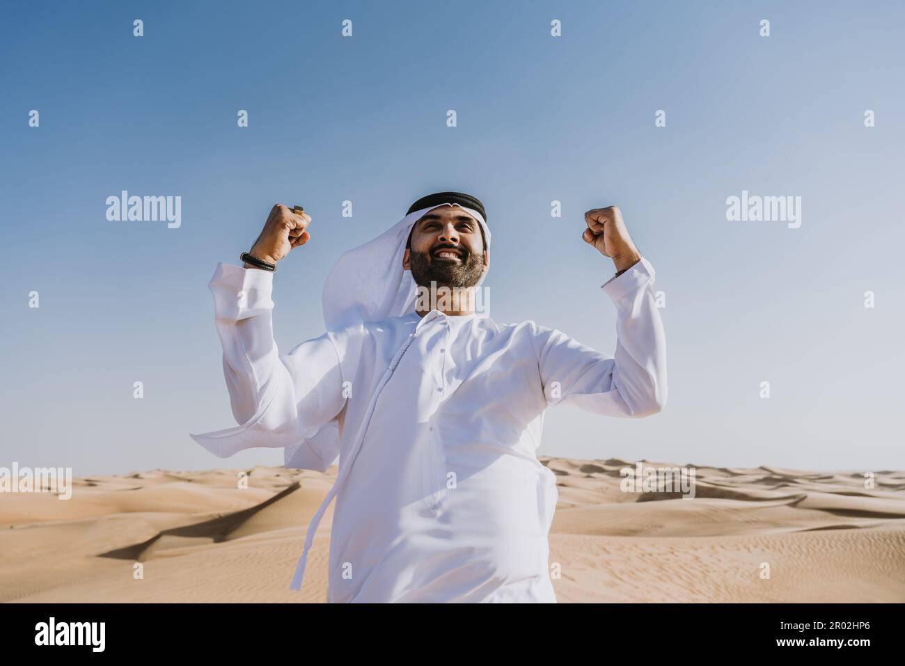 Handsome and successful middle-eastern man wearing traditional emirati ...