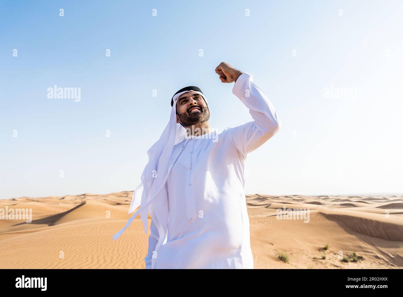 Handsome and successful middle-eastern man wearing traditional emirati ...