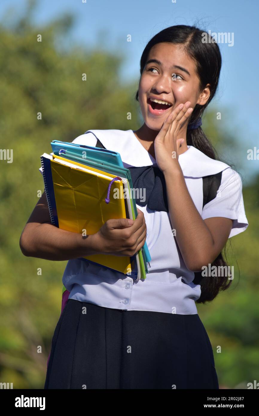 A Wearing Uniform With School Books Stock Photo - Alamy