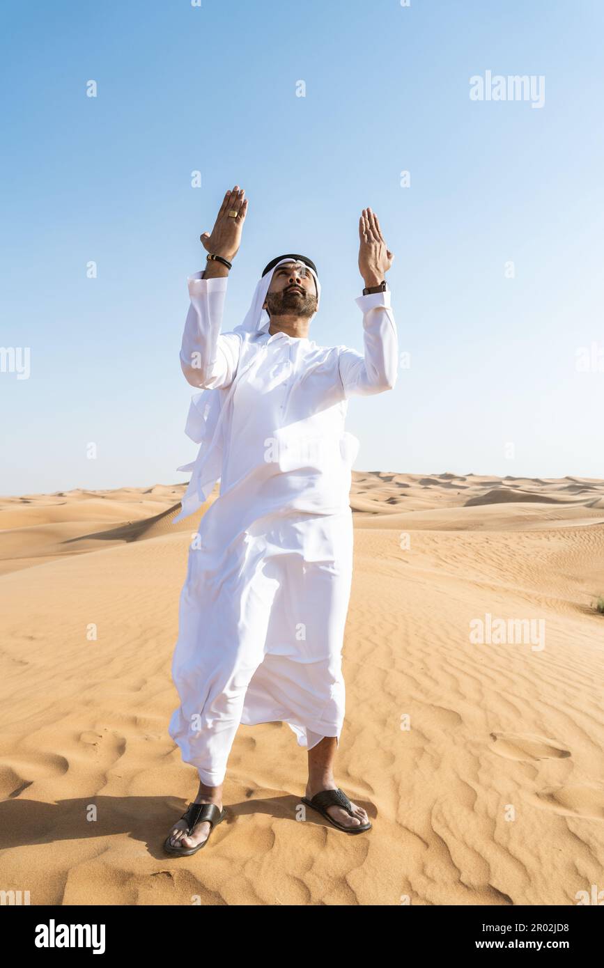 Handsome and successful middle-eastern man wearing traditional emirati ...