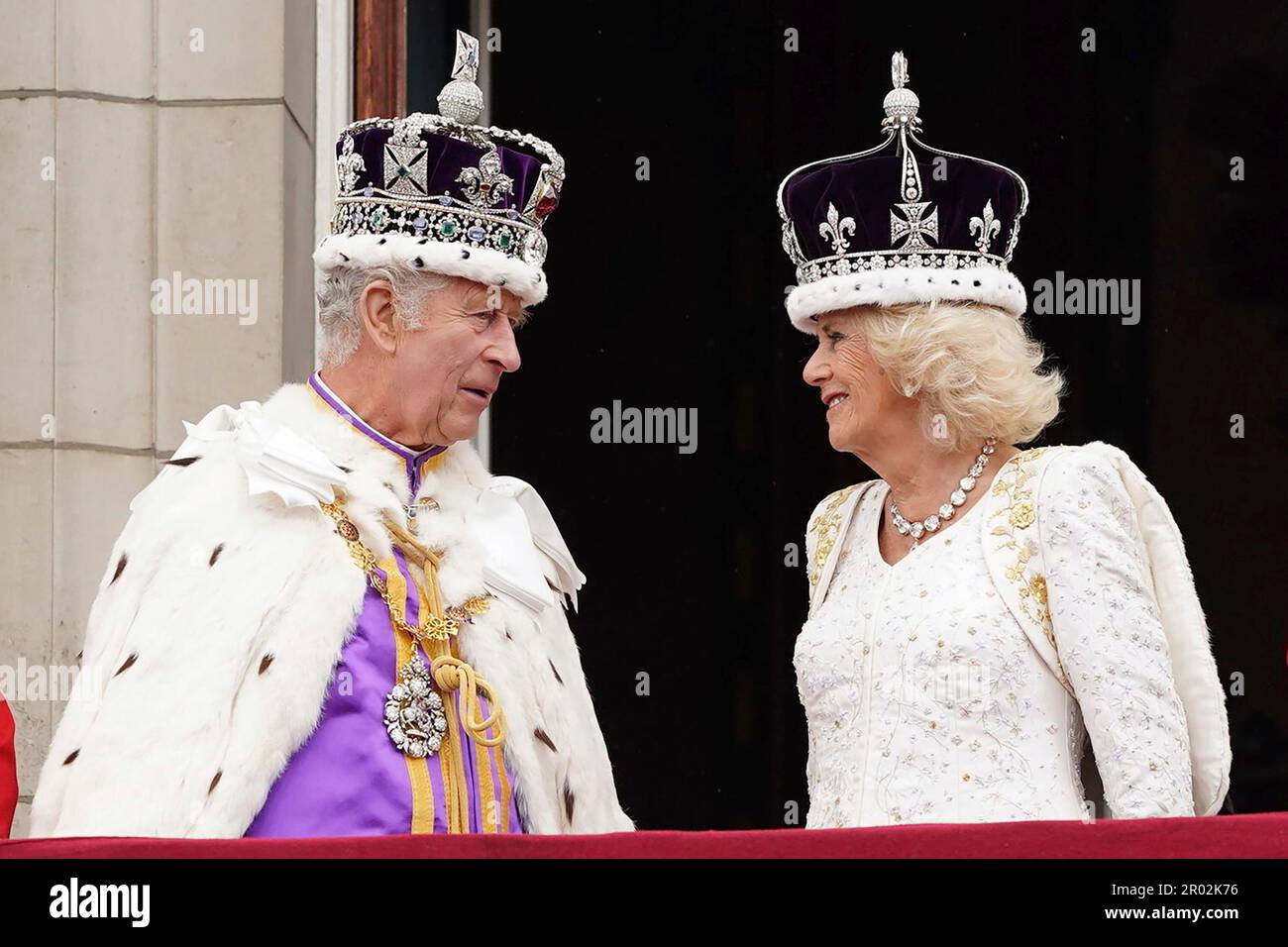 Britain's King Charles III and Queen Camilla stand on the balcony of ...