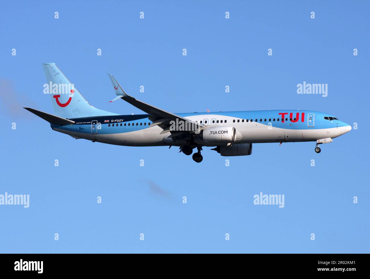 A Boeing 737-800 of TUI approaching London Gatwick Airport Stock Photo ...