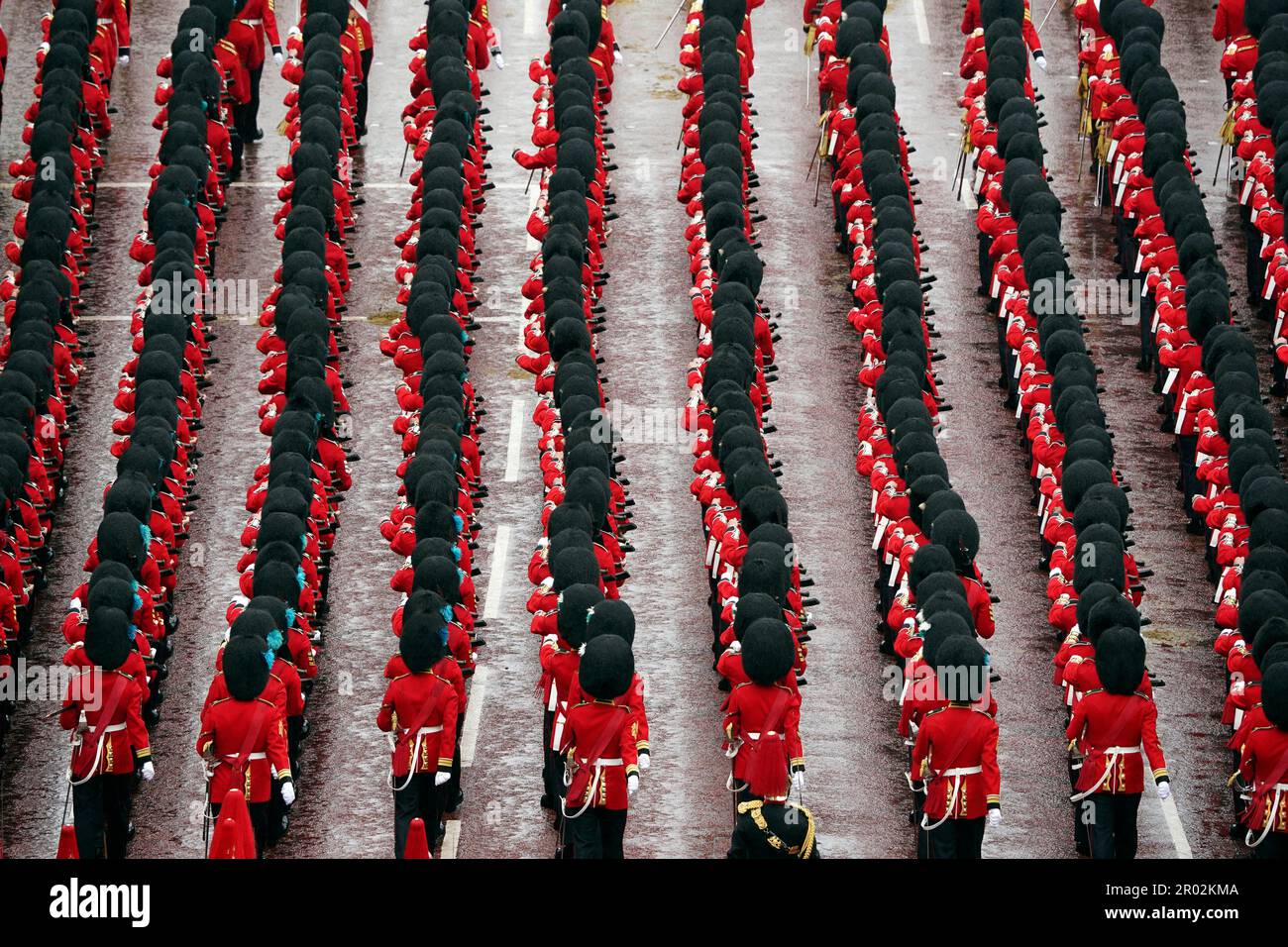 Military personnel march down the Mall in the King's Procession ahead ...