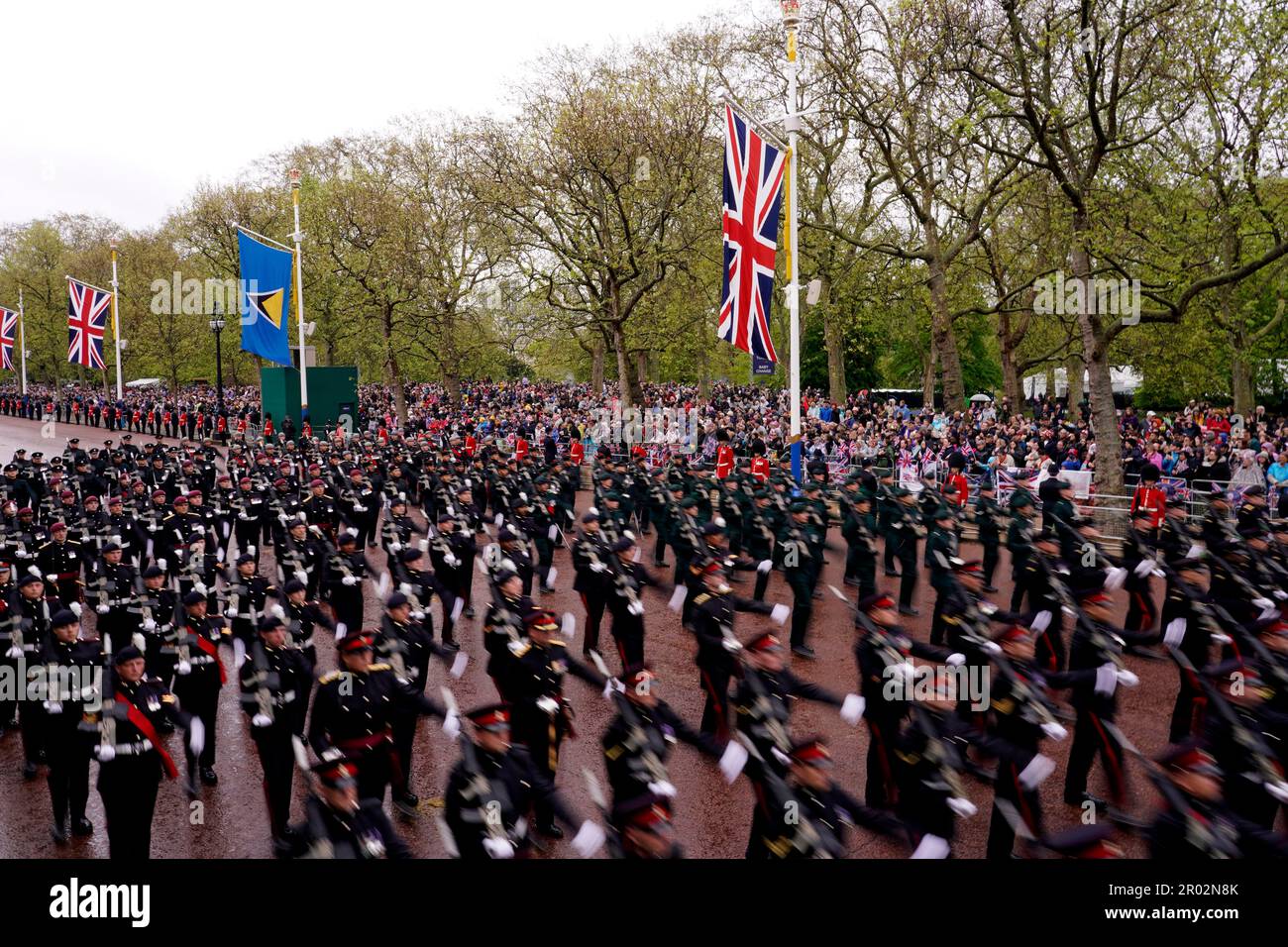 Soldiers march in a procession after the coronation ceremony of Britain ...