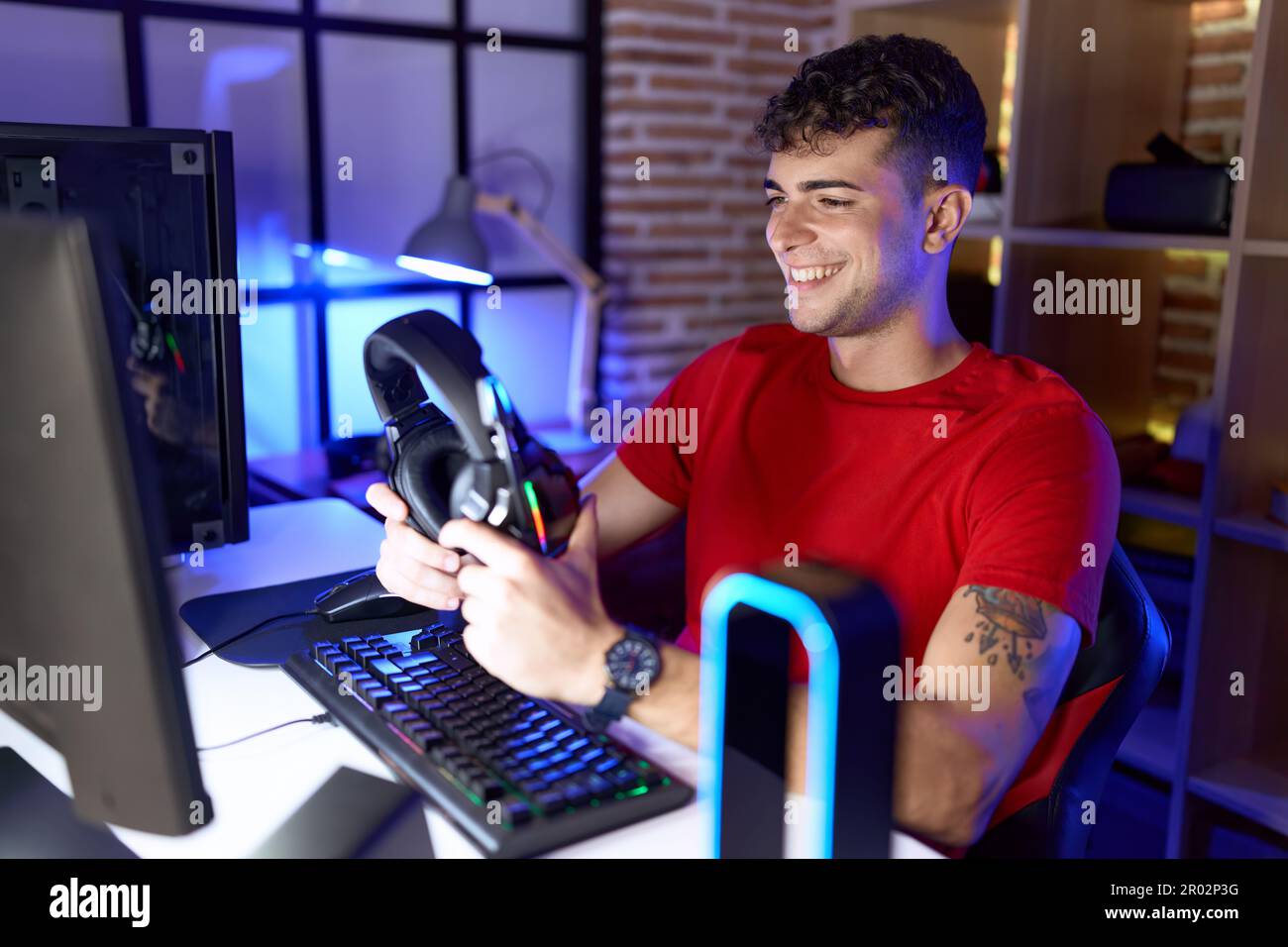 Attractive young hispanic man streamer hi-res stock photography and ...