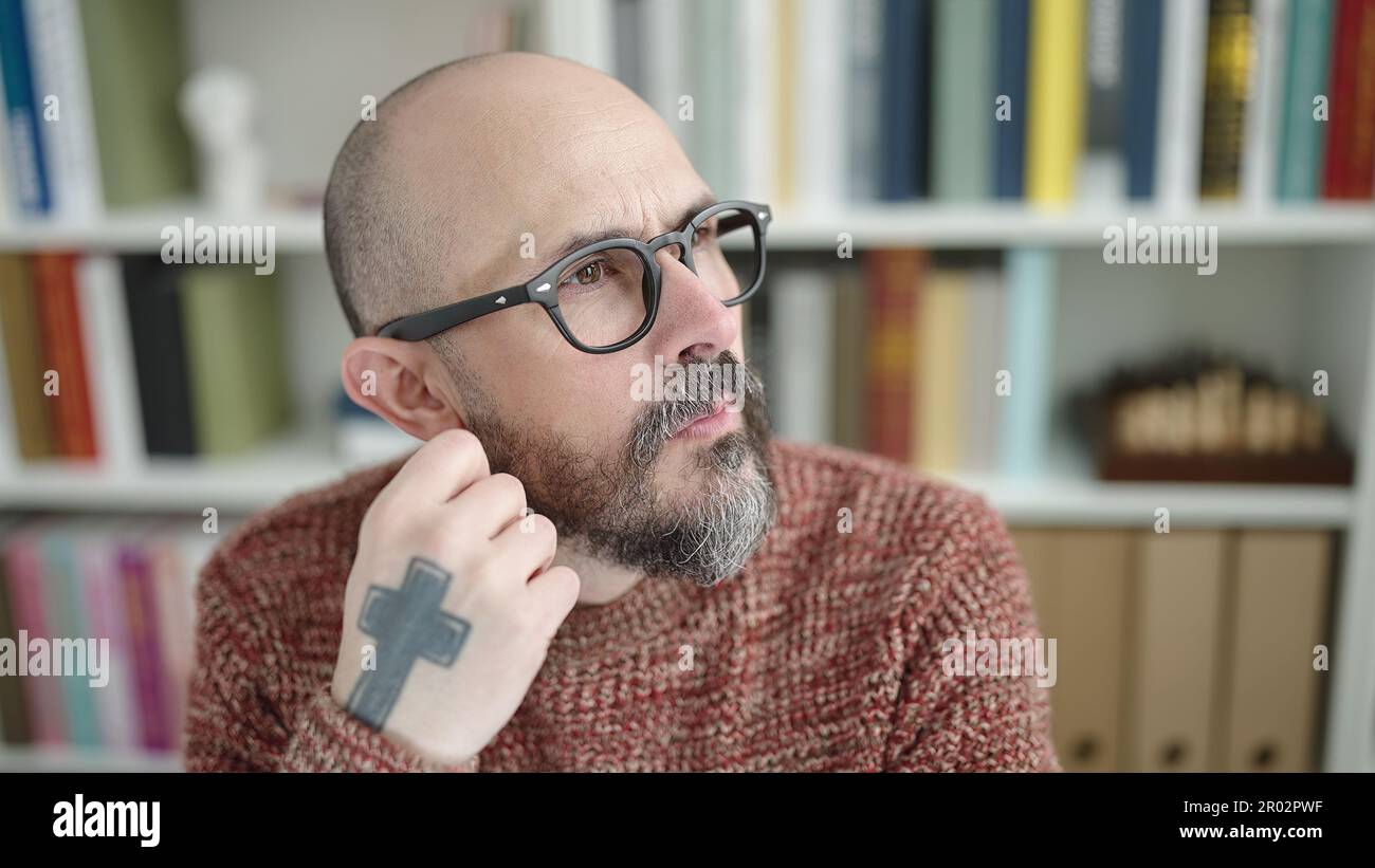 Young bald man teacher teaching hi-res stock photography and images - Alamy