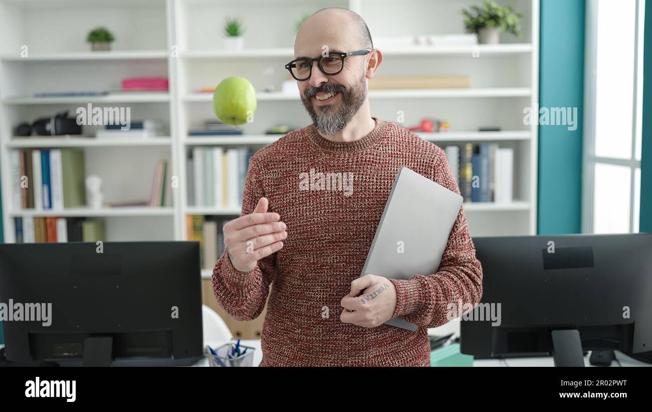 Young bald man teacher smiling hi-res stock photography and images - Alamy