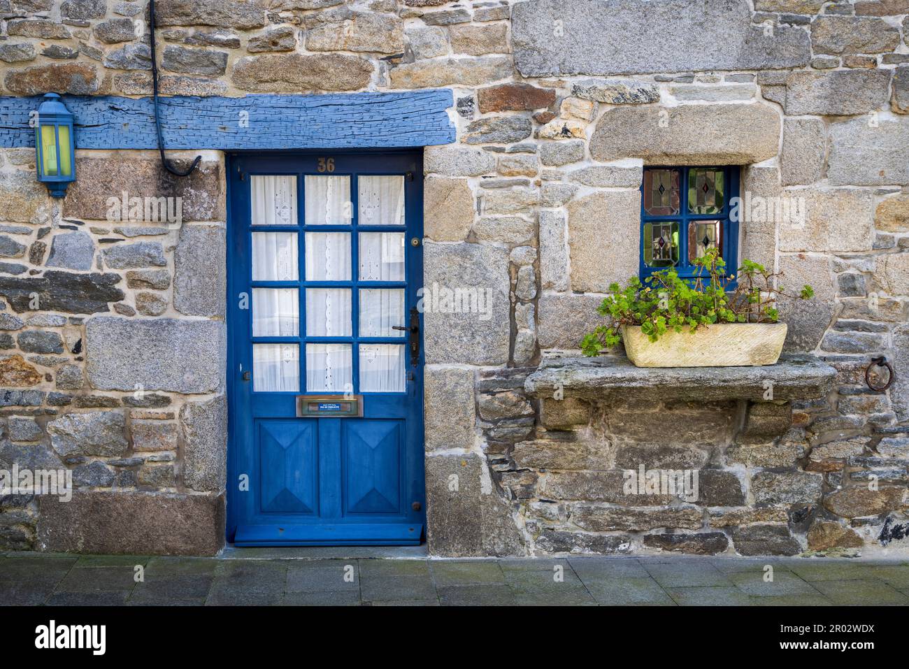 A house entrance in the streets of Roscoff, Brittany, France Stock ...