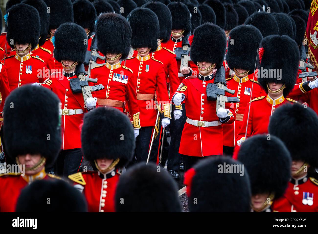London, UK. 06th May, 2023. Grenadier guards with bearskin helmets accompany the carriage of the ...