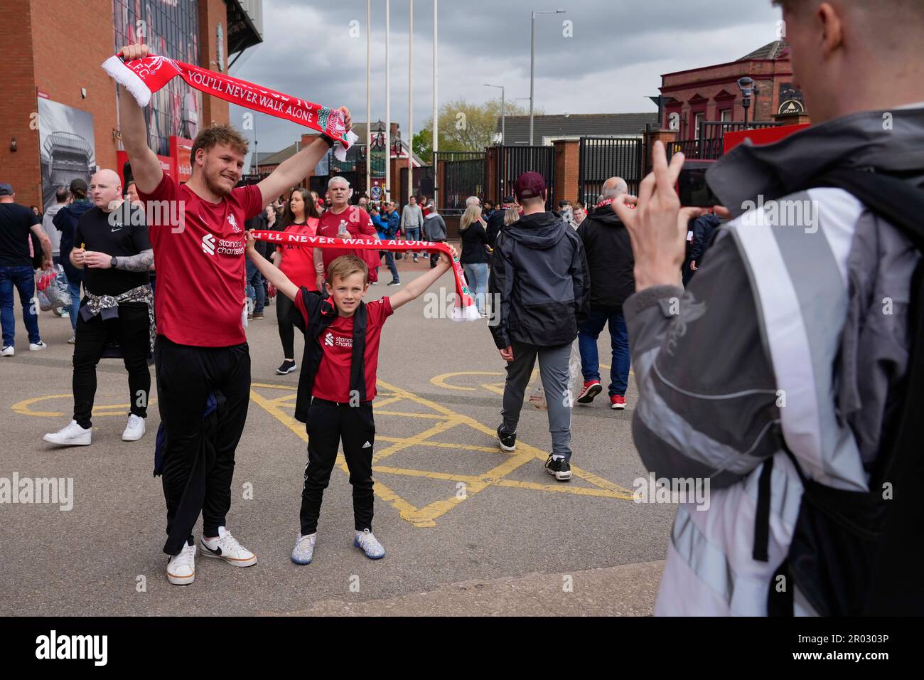 Liverpool fans pose for a photo before the Premier League match ...