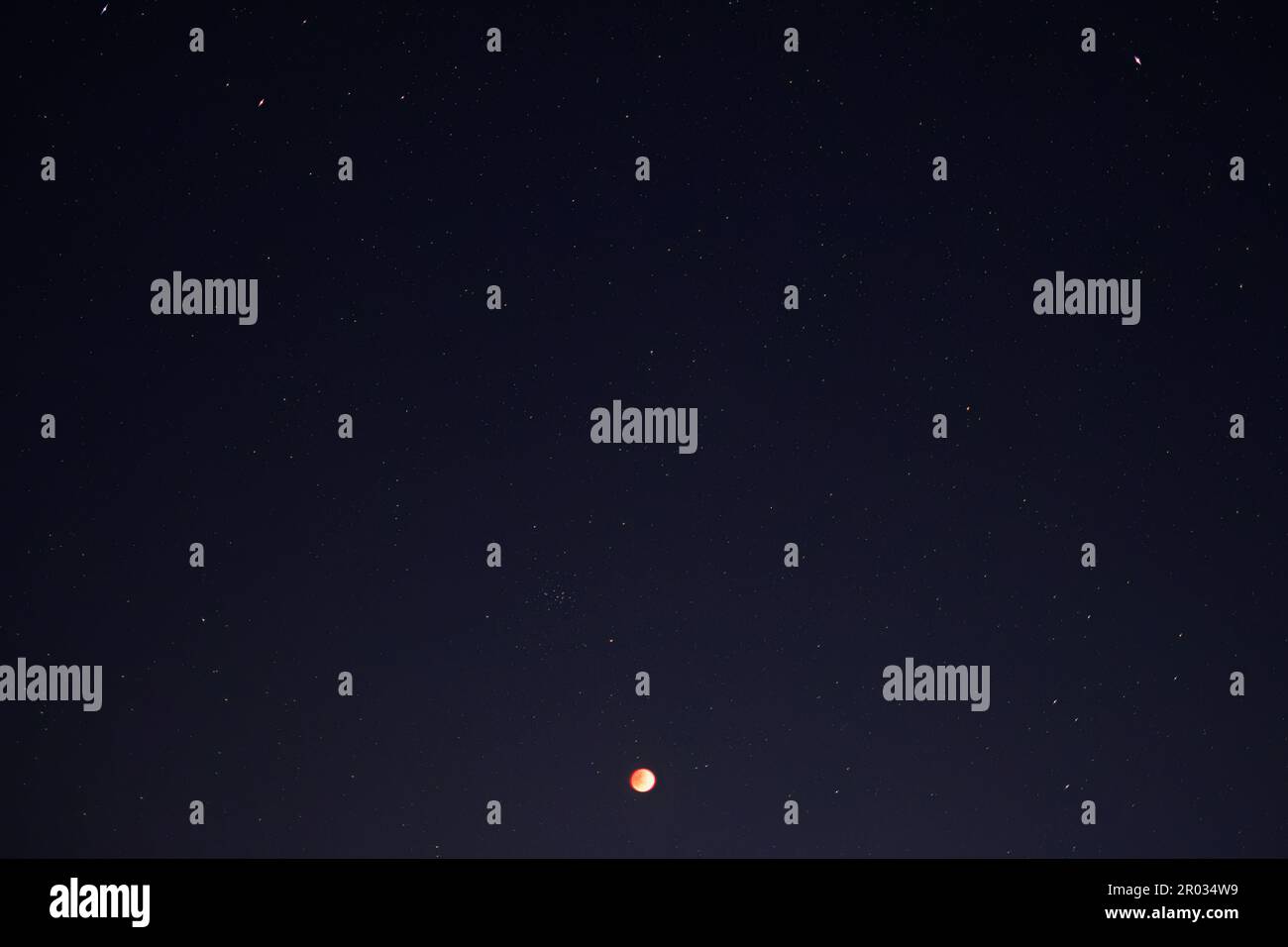 Total lunar eclipse blood moon with starry in the night sky Stock Photo ...