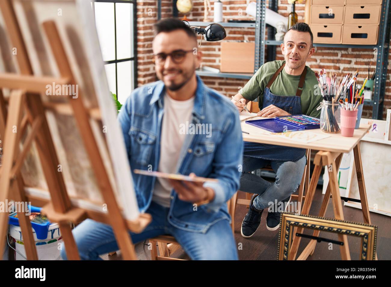 Two men artists smiling hi-res stock photography and images - Alamy