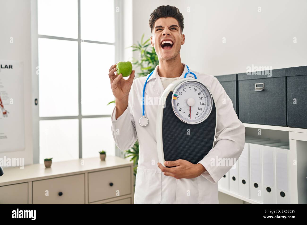 Strong man weighing scale hi-res stock photography and images - Alamy