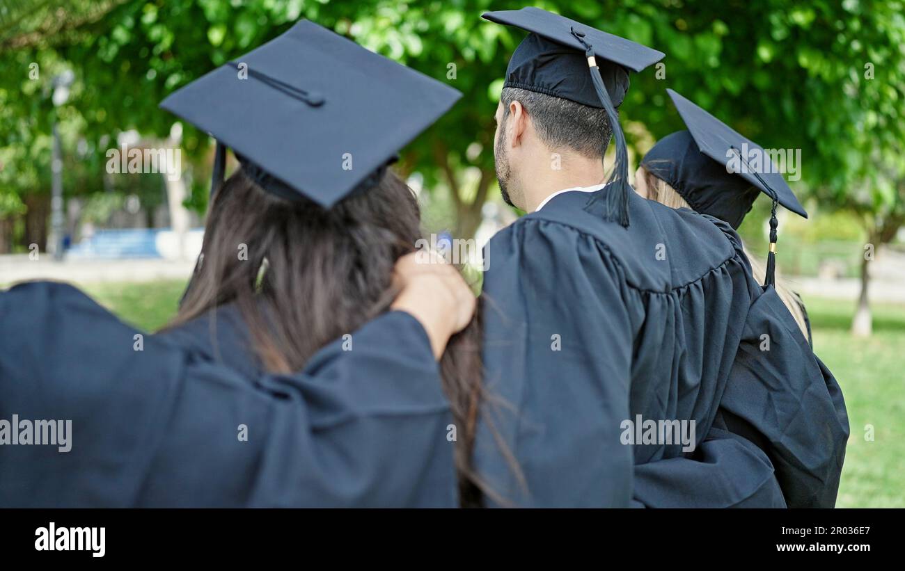 Group of people students graduated hugging each other backwards at ...