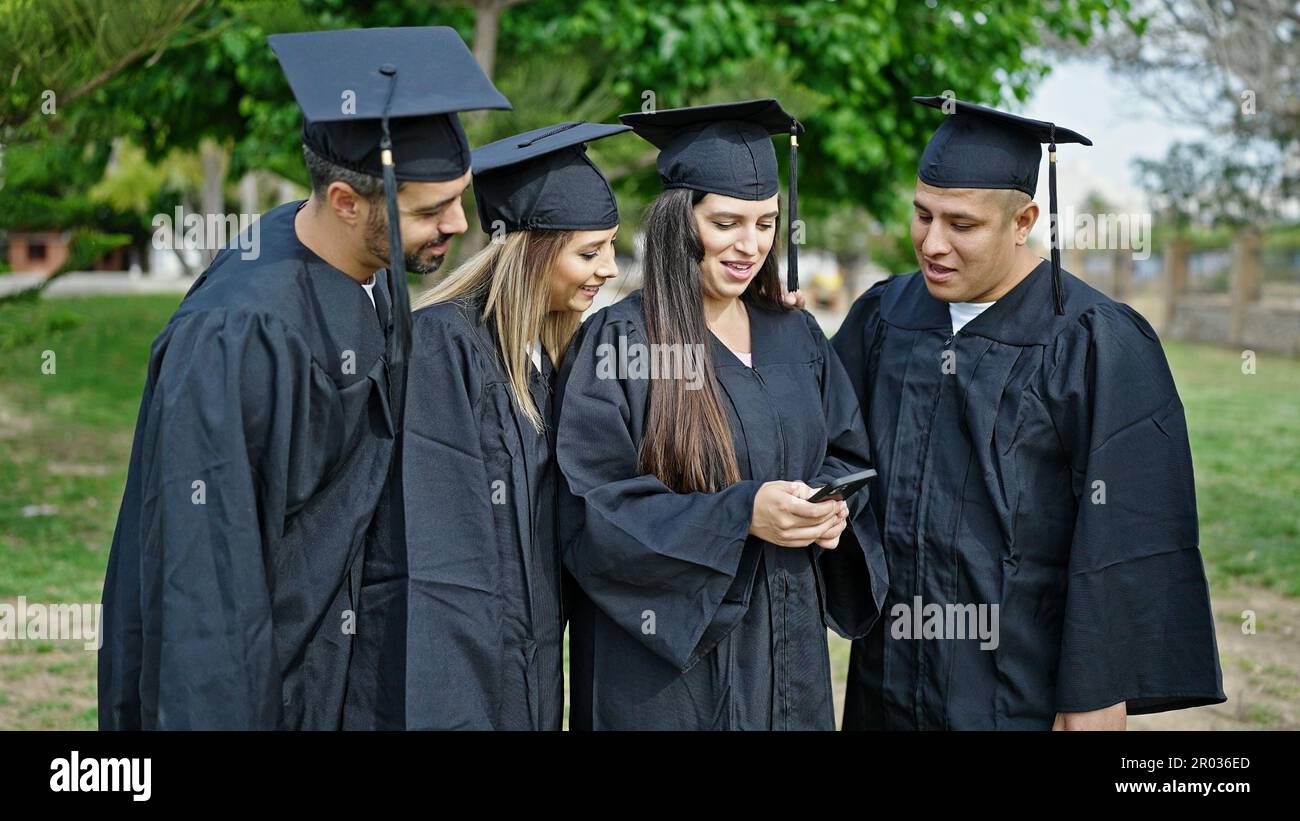 Group of people students graduated using smartphone at university ...