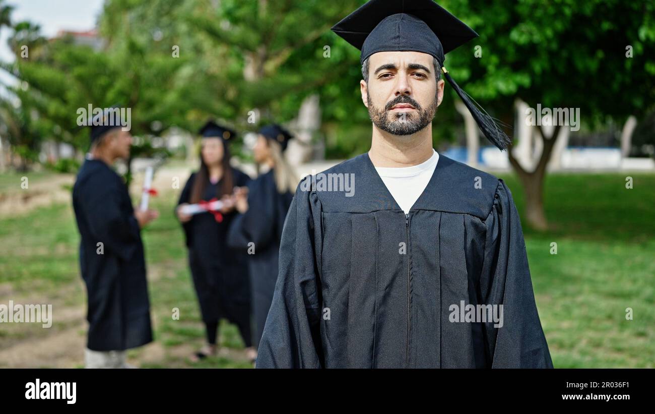 Group of people students graduated standing with relaxed expression at ...