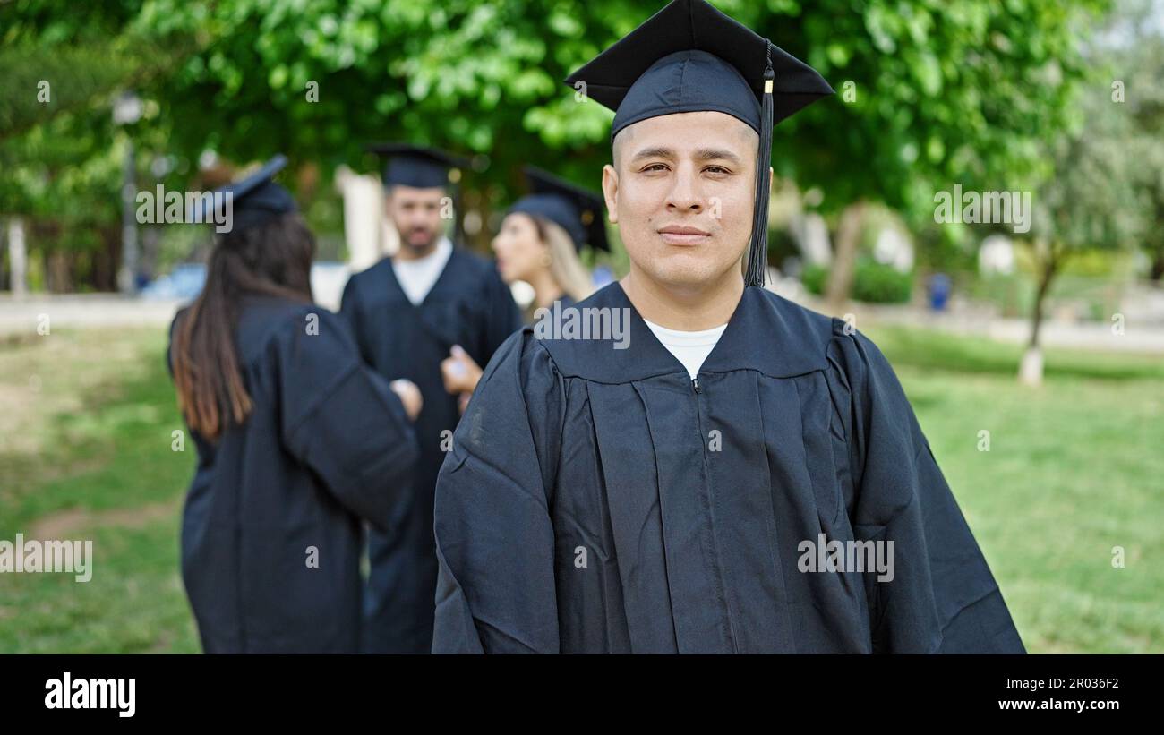 Group of people students graduated standing with relaxed expression at ...