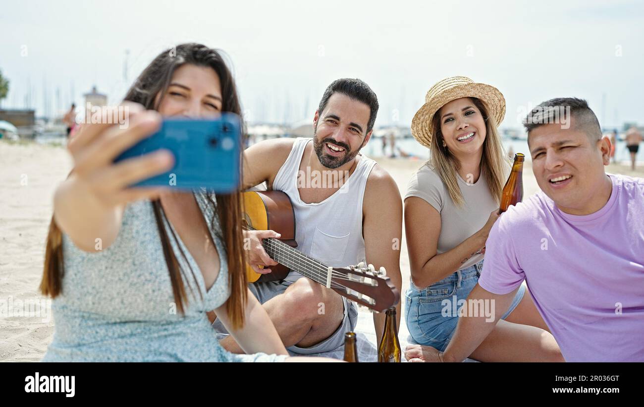 Group of people doing video call having party at beach Stock Photo - Alamy