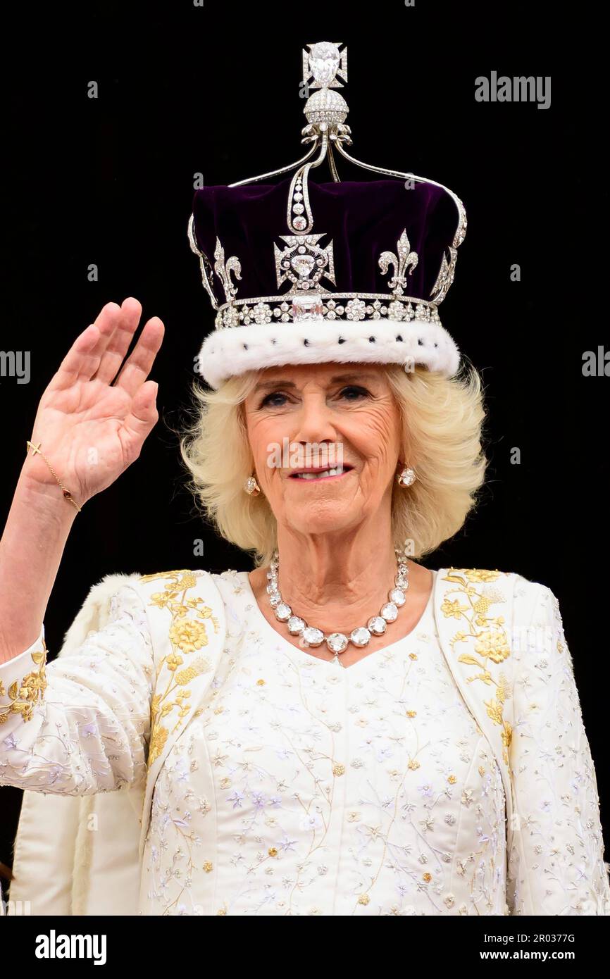 Queen Camilla waves from the balcony of the Buckingham Palace after her ...