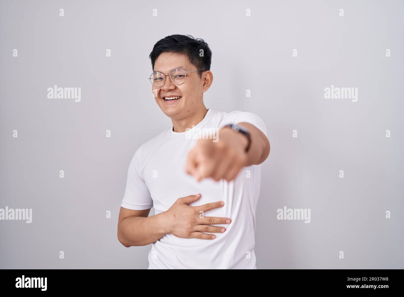 Positive korean male pointing finger hi-res stock photography and ...