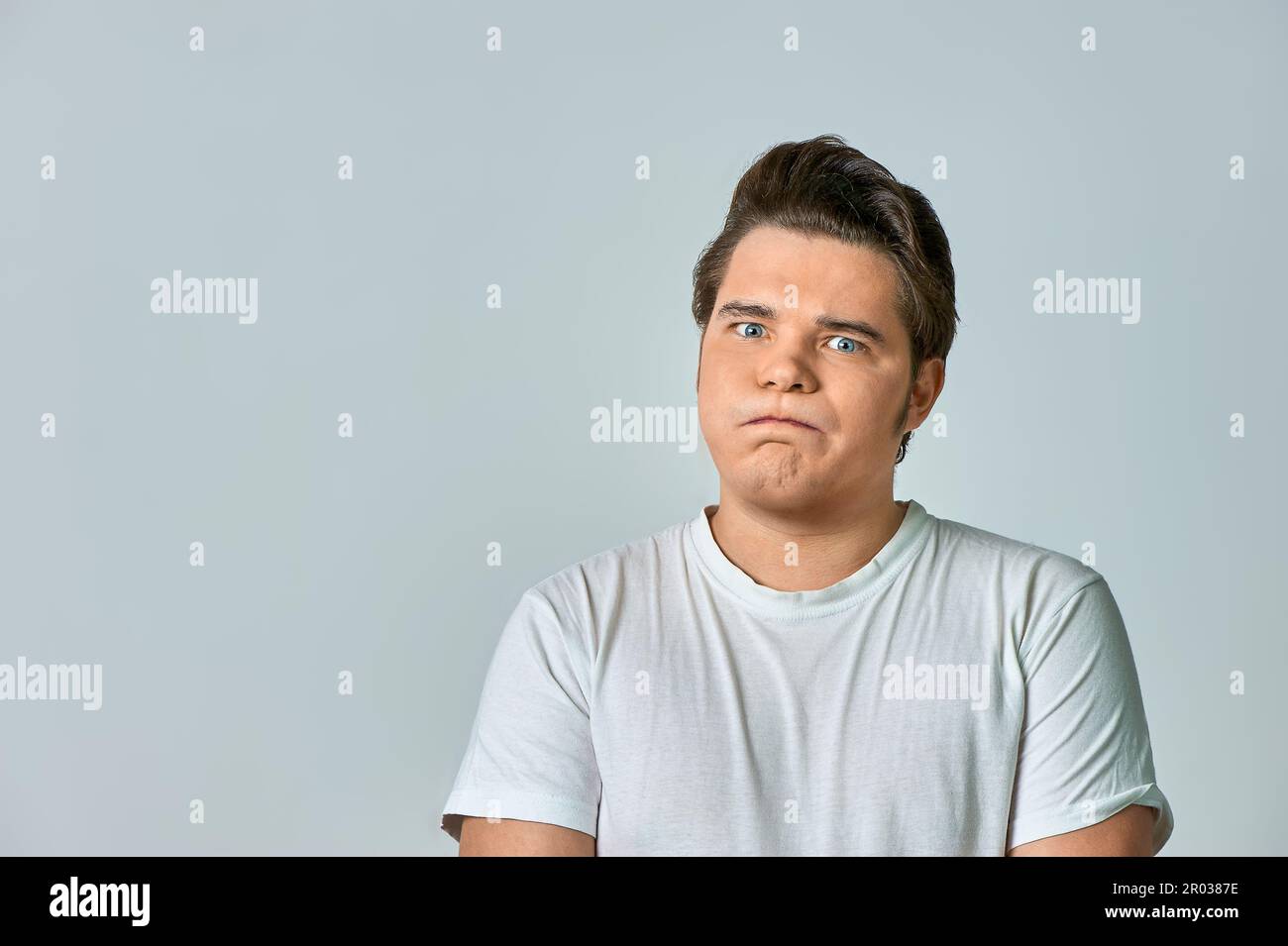 Close up frowning man hi-res stock photography and images - Alamy