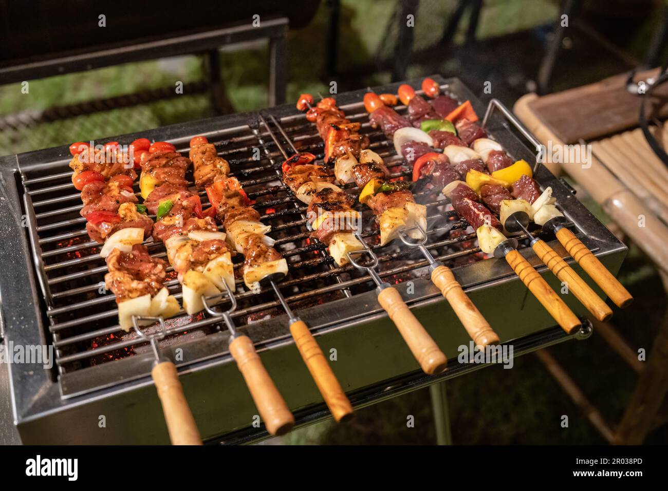 Barbeque skewers beef and pork with vegetable grilling on charcoal bbq ...