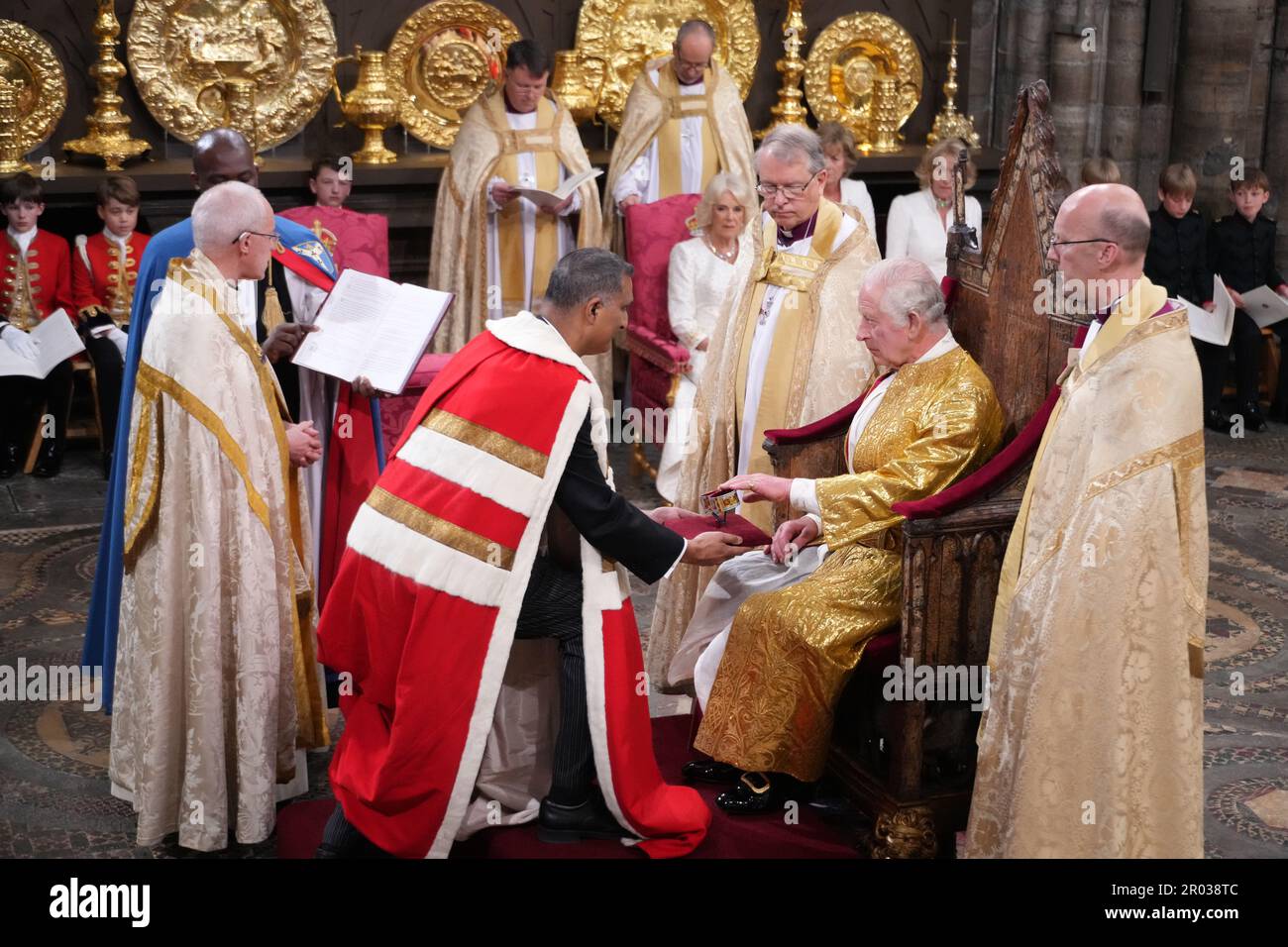 Lord Kamall presenting the Armills to King Charles III during his ...