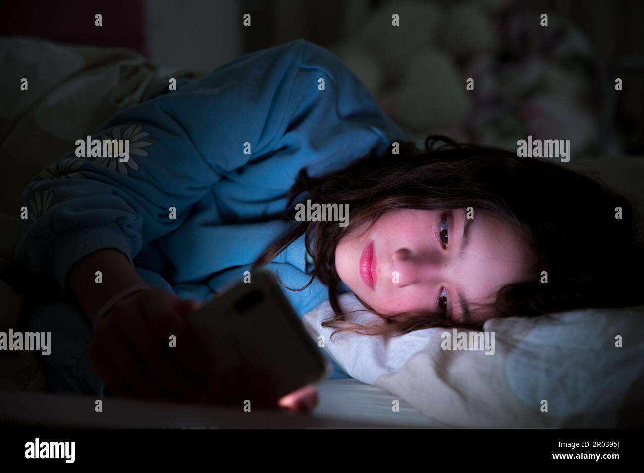 Video game children playing with video games in their bedroom hi-res ...