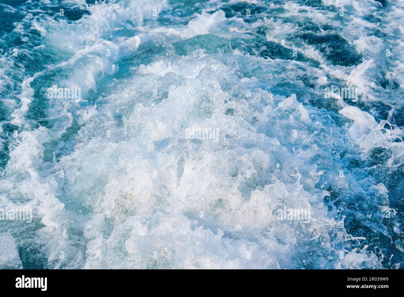 Sea water wave breaking and splashing during climate change Stock Photo ...