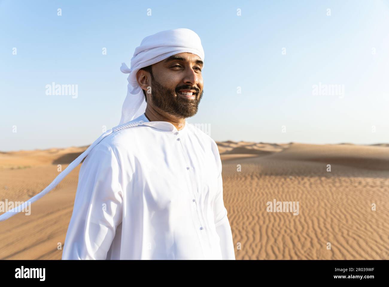 Handsome and successful middle-eastern man wearing traditional emirati ...