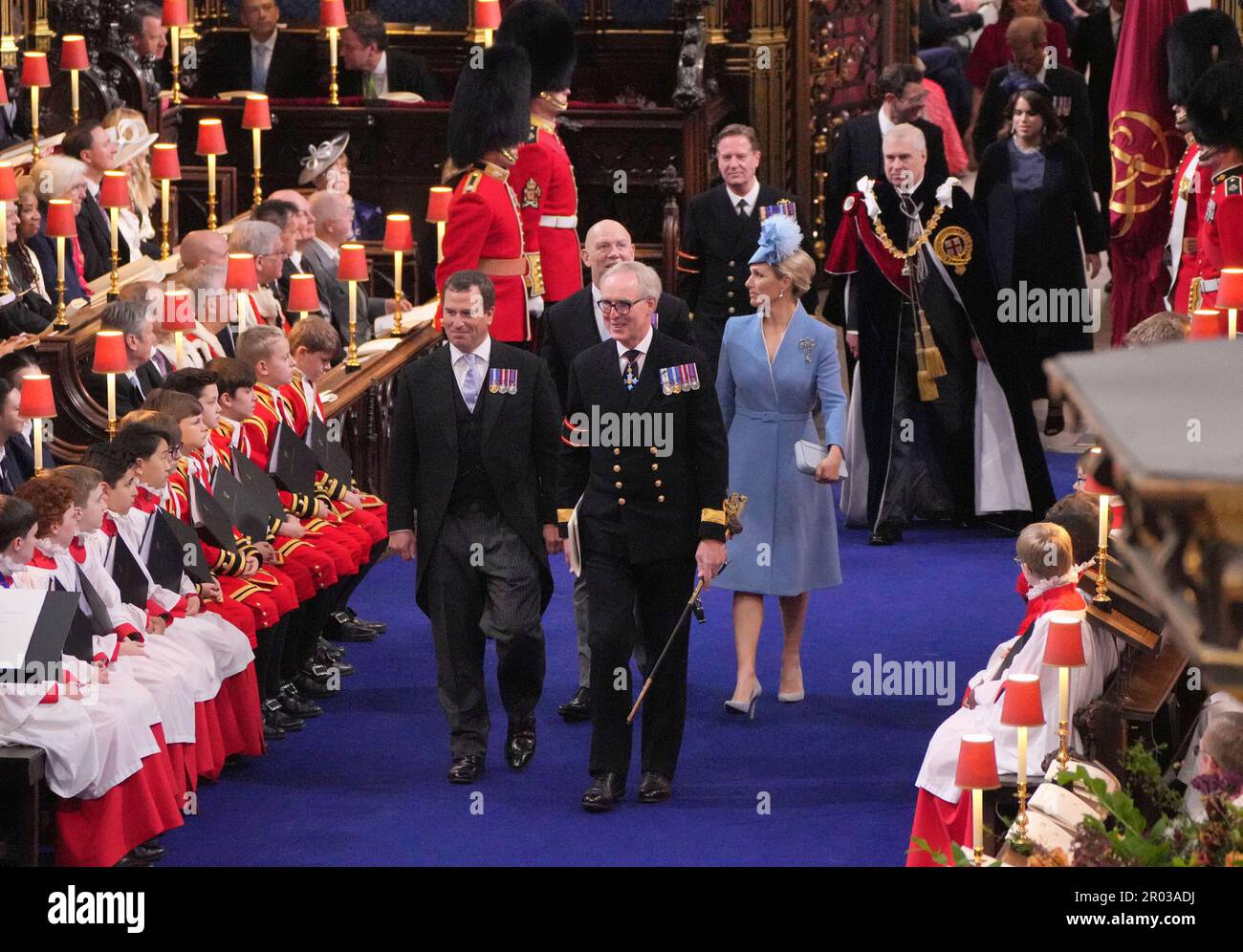 Peter Phillips (left) with Mike Tindall and Zara Tindall (behind ...