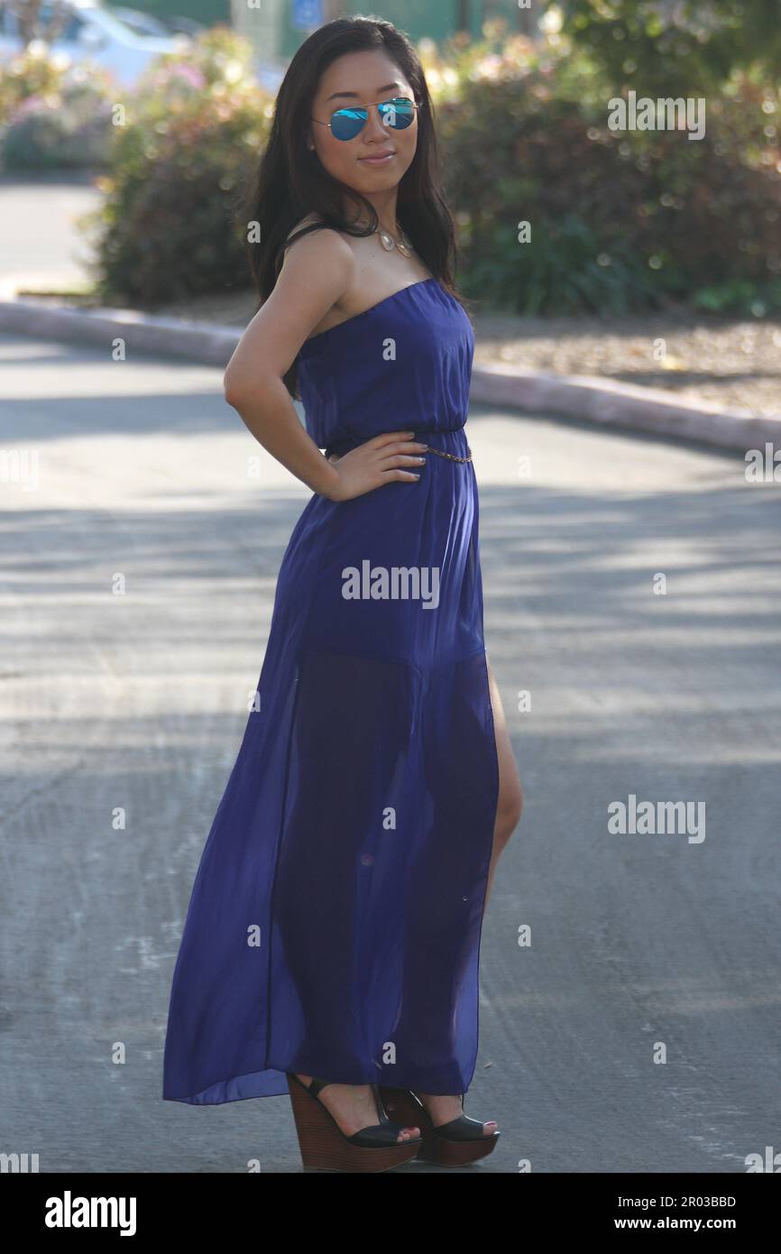 Photo of a pretty Chinese girl in a blue dress Stock Photo - Alamy