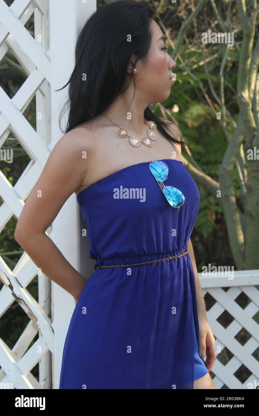Photo of a pretty Chinese girl in a blue dress Stock Photo - Alamy