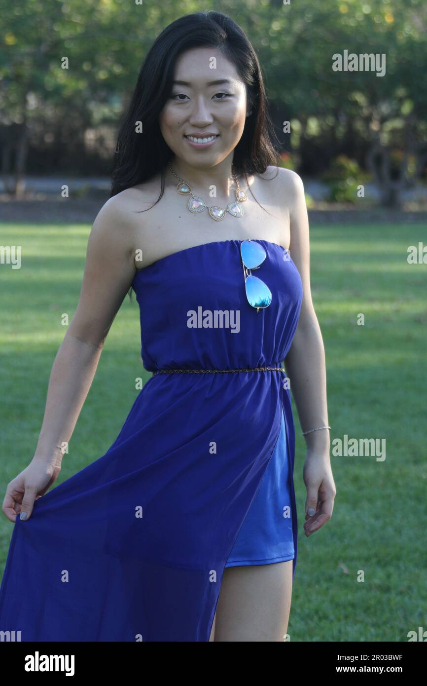 Photo of a pretty Chinese girl in a blue dress Stock Photo - Alamy