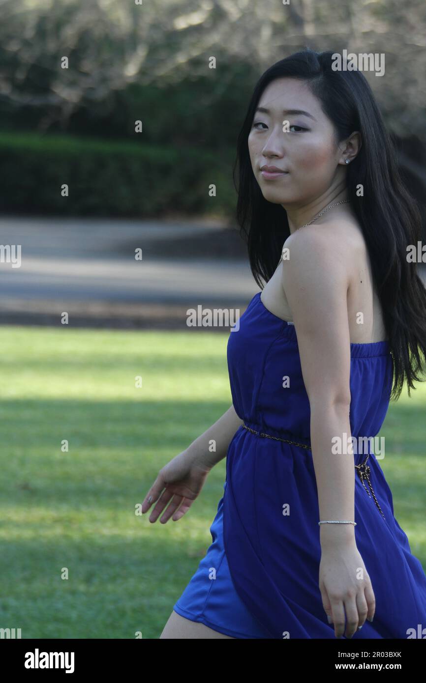 Photo of a pretty Chinese girl in a blue dress Stock Photo - Alamy