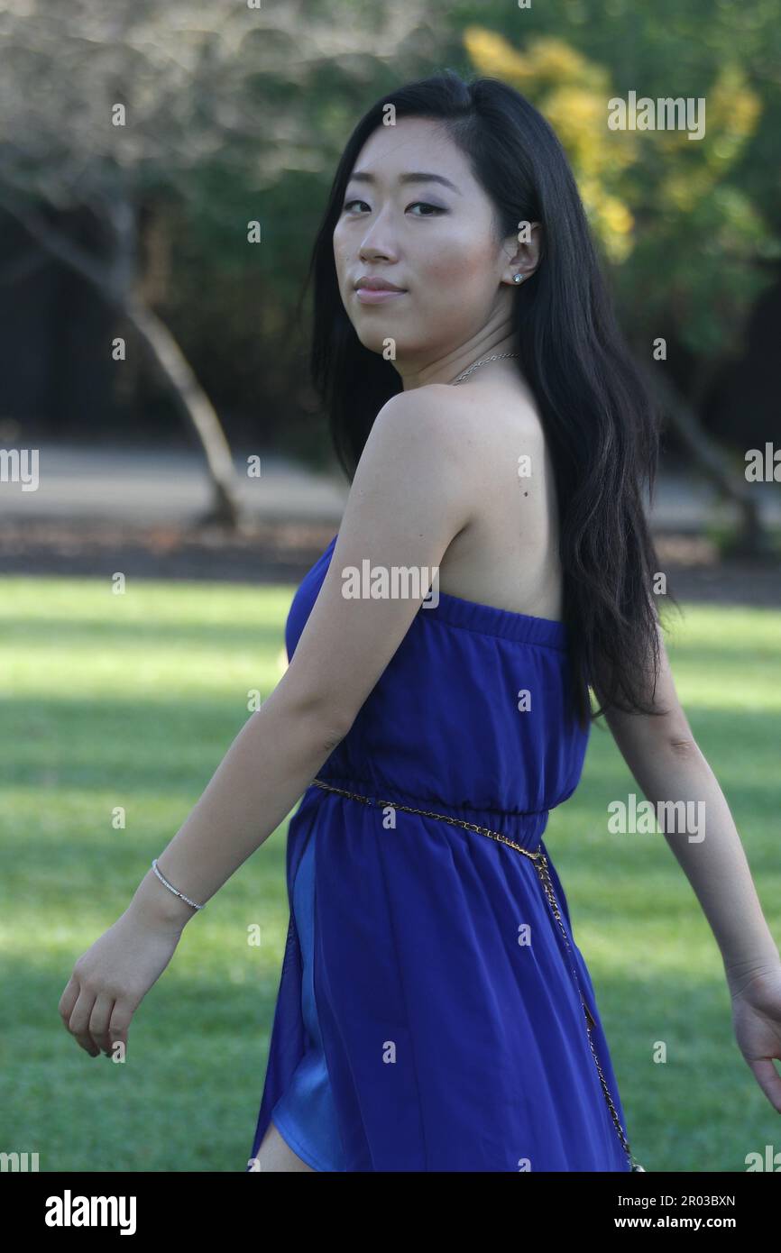 Photo of a pretty Chinese girl in a blue dress Stock Photo - Alamy