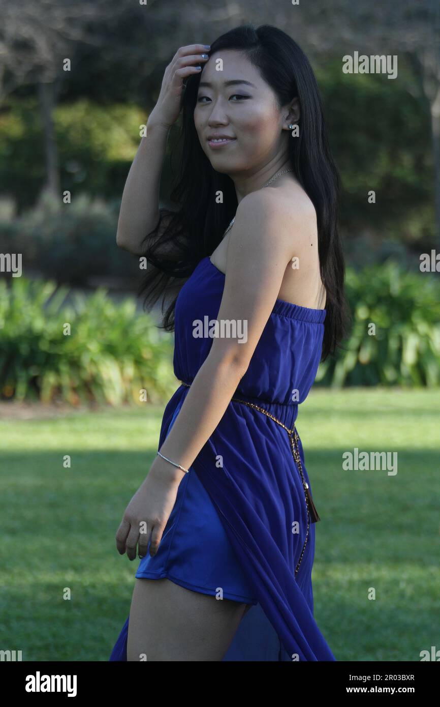 Photo of a pretty Chinese girl in a blue dress Stock Photo - Alamy