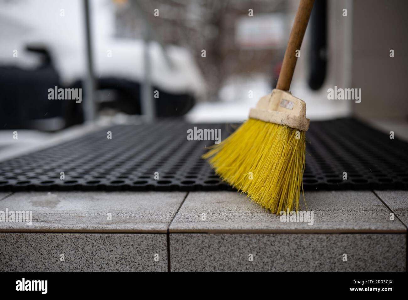 Broom in front of door hi-res stock photography and images - Alamy