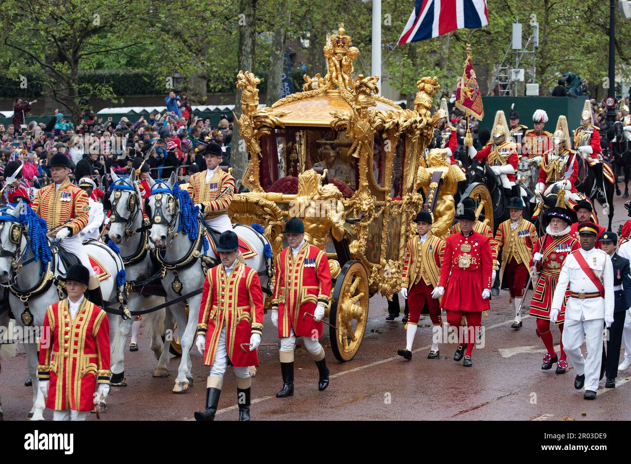 King Charles III and Queen Camilla are carried in the Gold State Coach ...