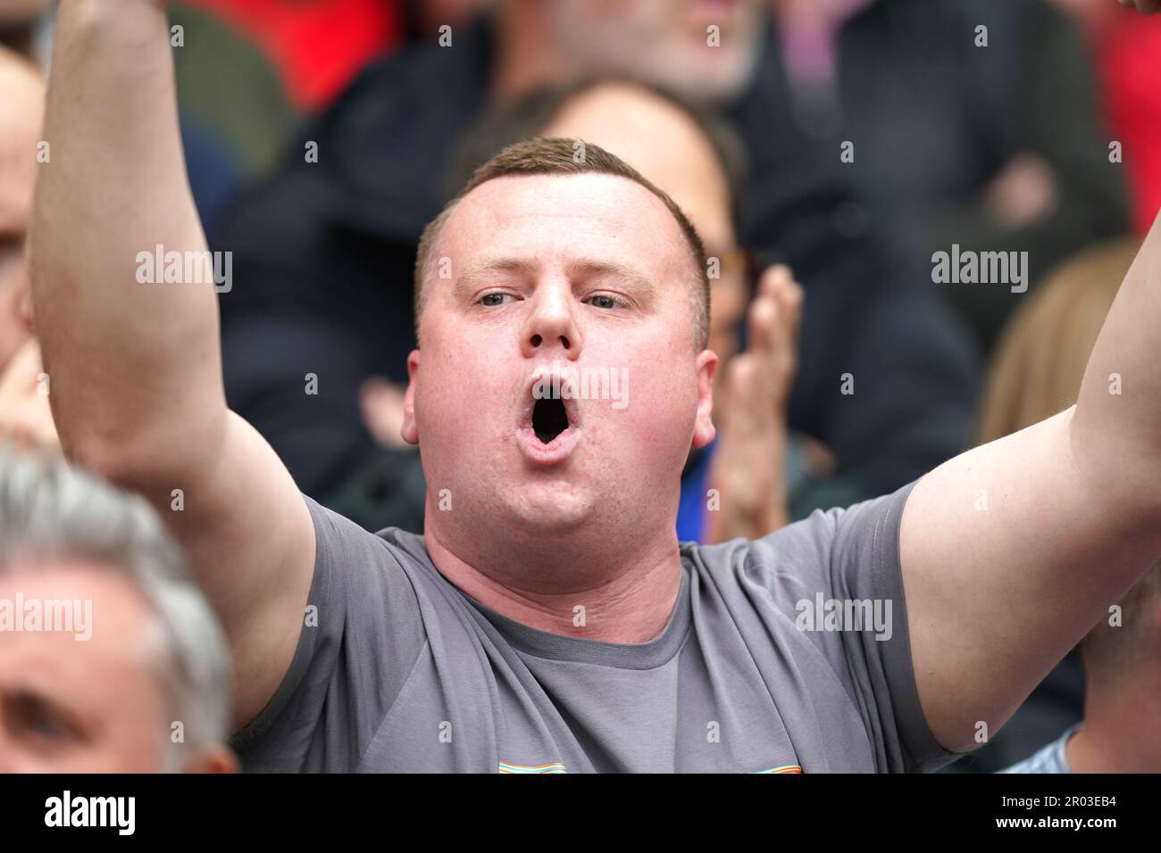 A Liverpool fan boos the national anthem before the Premier League ...