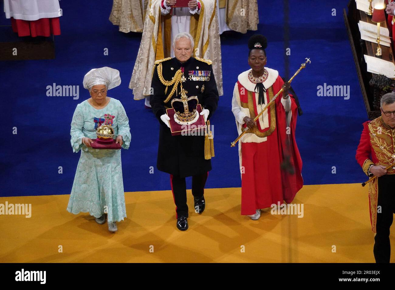 The Orb, the Sceptre with Dove and St Edward's Crown are brought to the ...