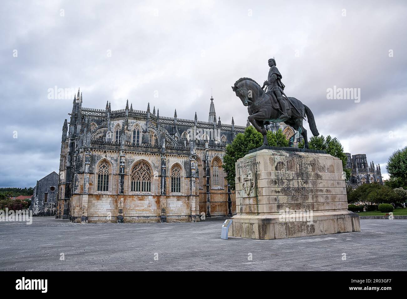Square with monument in front of Batalha Cathedral in Portugal Stock ...