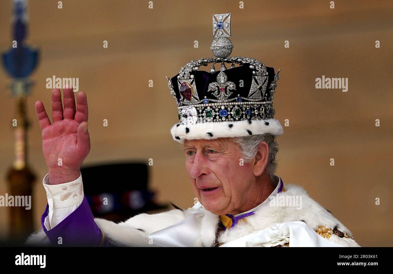 King Charles III receives a royal salute from members of the military ...