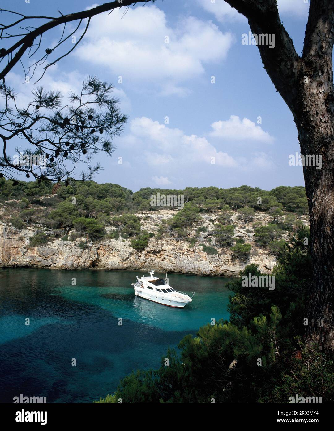 Spain. Balearic Islands. Mallorca. Cala Pi. Luxury boat in bay Stock ...