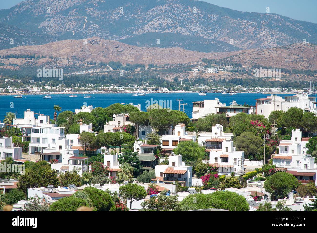 Bodrum Town houses at sunny day. Traditional white house, flowers ...