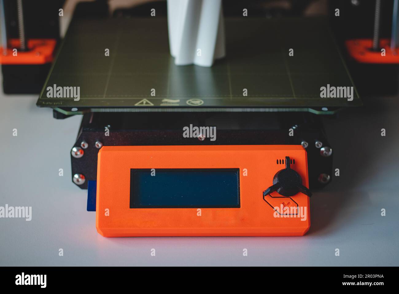 Technological hi-teg tool for making new things. A black and red 3D ...