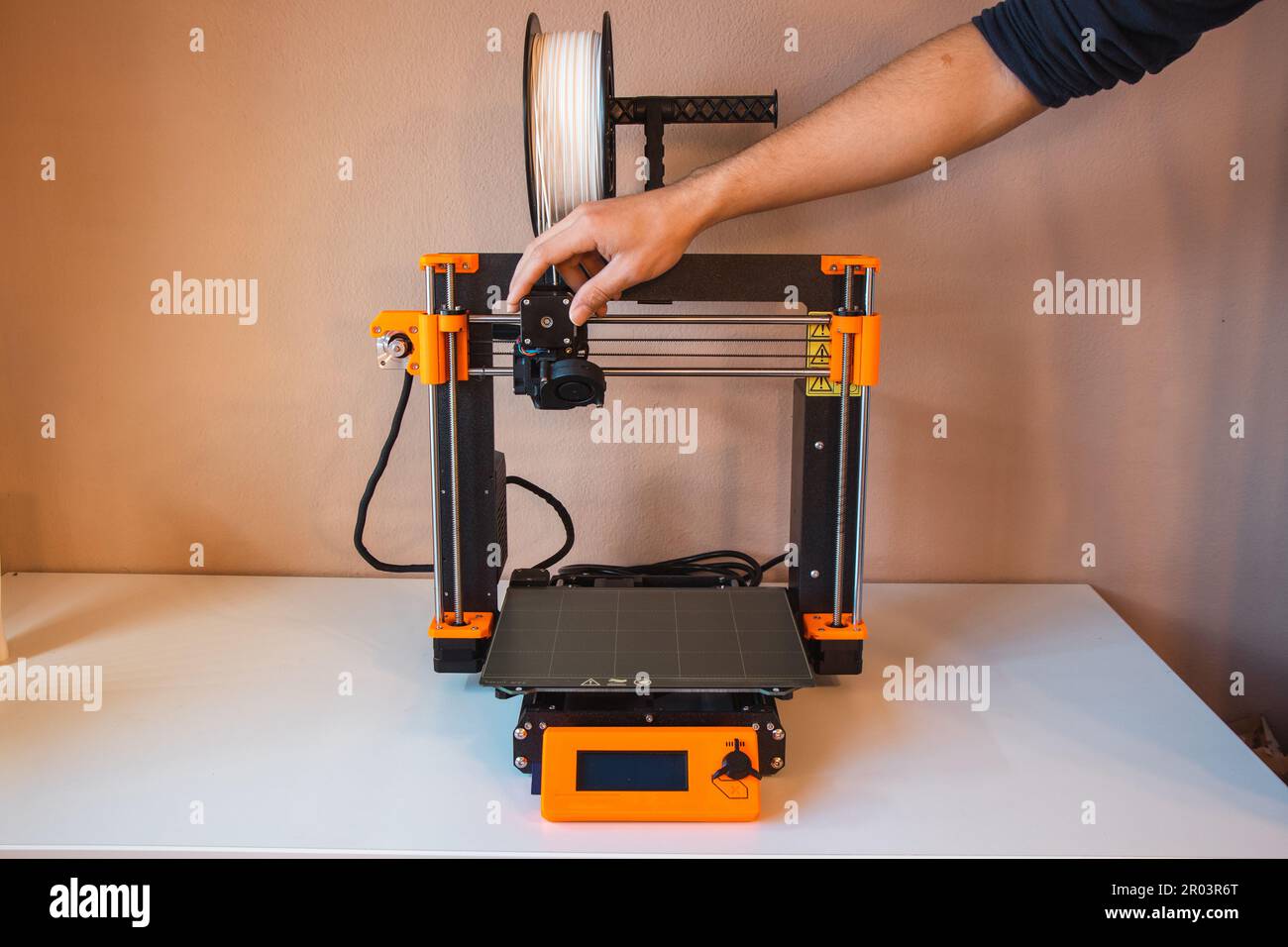 Technological hi-teg tool for making new things. A black and red 3D ...